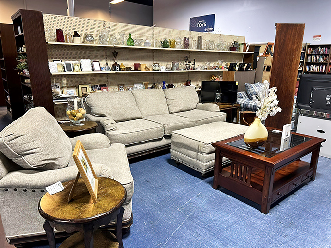 Living room vignettes invite you to imagine these pieces in your own home, minus the fluorescent lighting and blue floor.