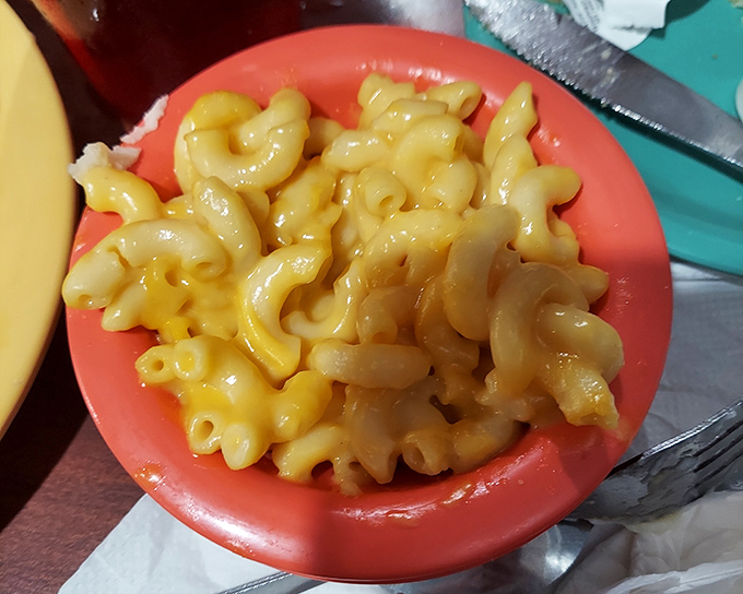 Mac and cheese that would make your childhood self weep with joy. Each spiral pasta curve perfectly captures the creamy cheese sauce &ndash; engineering at its finest.