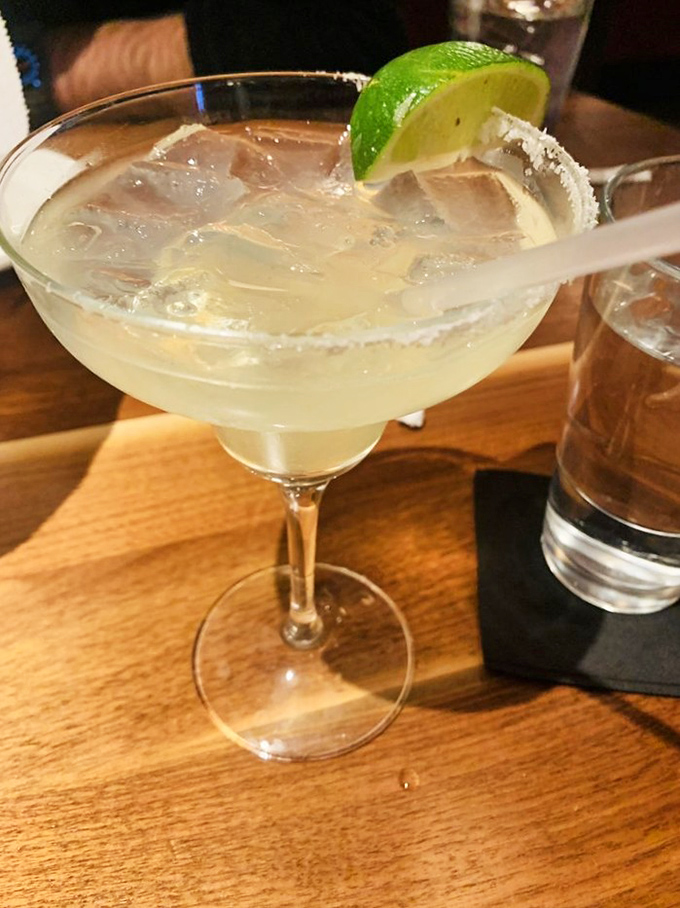 A margarita so pristine it belongs in the cocktail hall of fame. That salt rim is the jewelry this liquid gem deserves.