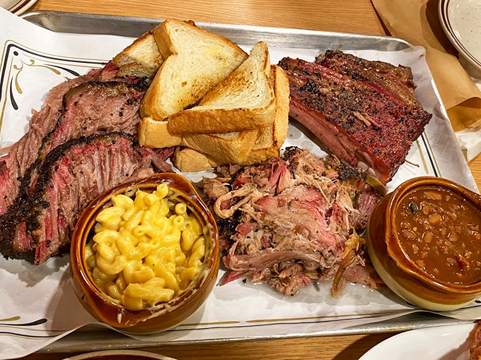 The meat platter arrives like a carnivore's dream &ndash; brisket, ribs, and pulled pork sharing space with mac and cheese and beans that have clearly been taking notes.
