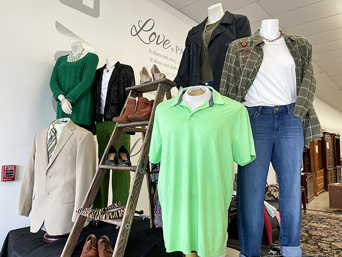 Mannequins modeling thrifted fashion that looks anything but second-hand. That green sweater is practically begging for a spot in your closet.