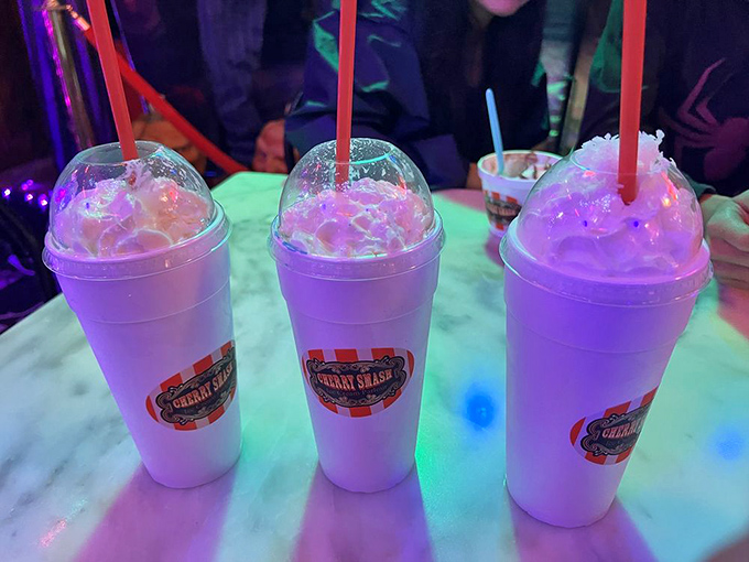 These aren't just milkshakes, they're liquid light shows! Glowing under purple lights, these frosty concoctions promise a psychedelic flavor experience.