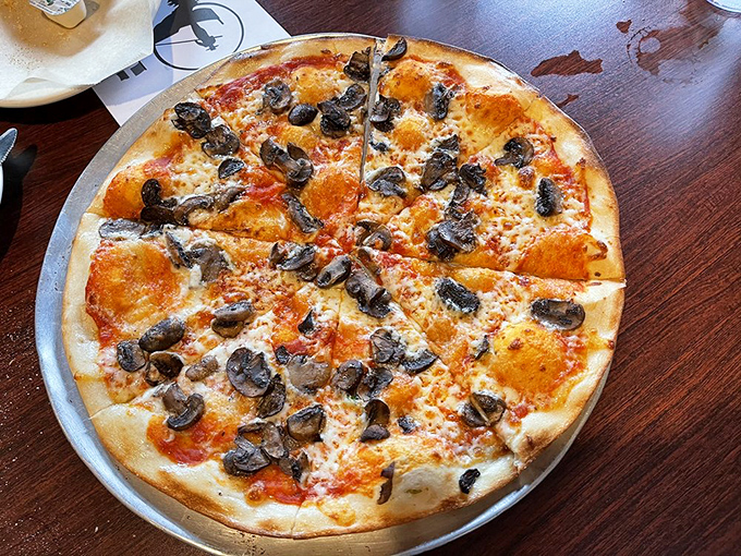 Pizza perfection with mushrooms and pepperoni &ndash; that crispy-yet-chewy crust and bubbling cheese remind us why some classics never need reinvention.