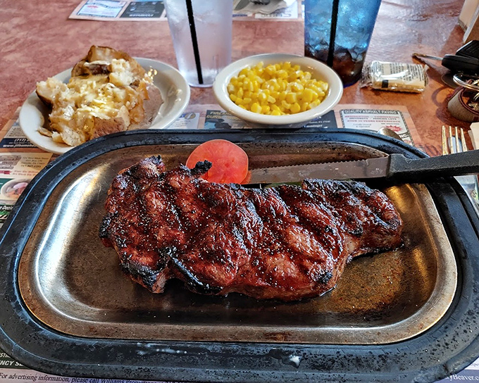 This NY Strip steak isn't just cooked—it's been treated with the respect a good piece of beef deserves. The knife is merely a formality.