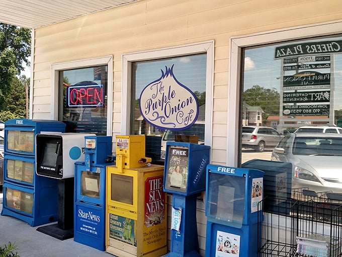 Newspaper dispensers outside&mdash;a charming reminder that some pleasures, like good food and local news, remain timeless.