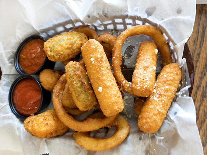 These aren't just onion rings &ndash; they're crispy, golden halos of happiness that make you wonder why anyone would ever choose fries as their side dish.