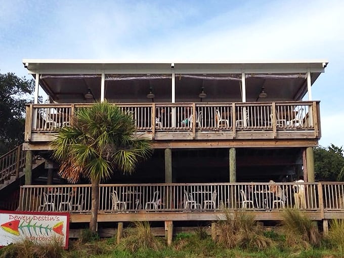 The two-story wooden structure stands like a sentinel overlooking the harbor, promising seafood pilgrims that their journey wasn't made in vain. 