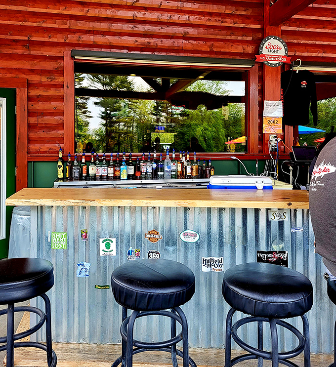 The outdoor bar combines corrugated metal, wood, and enough spirits to make you forget you're in the middle of nowhere&mdash;in the best possible way.