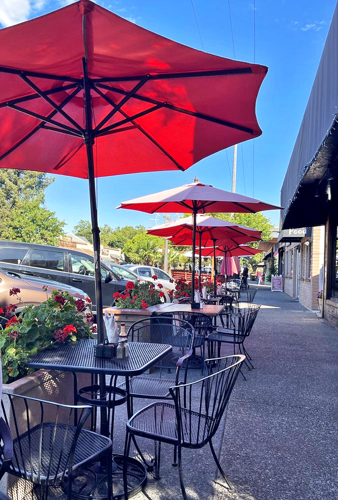 Red umbrellas create islands of shade for outdoor diners&mdash;California sunshine optional, appetite absolutely required.