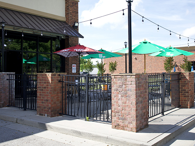 The outdoor patio beckons with the promise of fresh air and fresh flavors. String lights stand ready to illuminate your evening burger adventures.