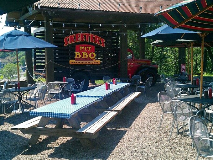 The outdoor patio—where fresh air meets fresh BBQ. Those picnic tables have heard more food-induced moans of pleasure than most therapists.