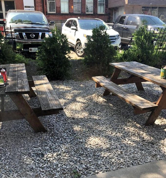 Those outdoor picnic tables have witnessed more moments of smoked meat bliss than most therapists' couches. Simple pleasures in gravel form.