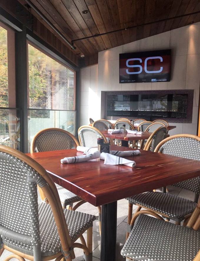 Tables set with care and napkins standing at attention. The calm before the delicious storm of a memorable meal in comfortable surroundings.