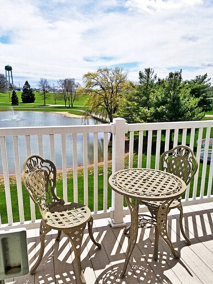 A balcony view that serves tranquility as a complimentary side dish. After that meal, these chairs offer the perfect spot for contemplating whether you can squeeze in one more pie slice.