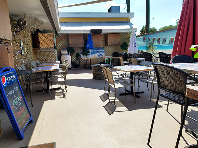 The outdoor patio offers a sun-drenched alternative for those who've had enough air conditioning for one Florida day. Sea breeze included at no extra charge.