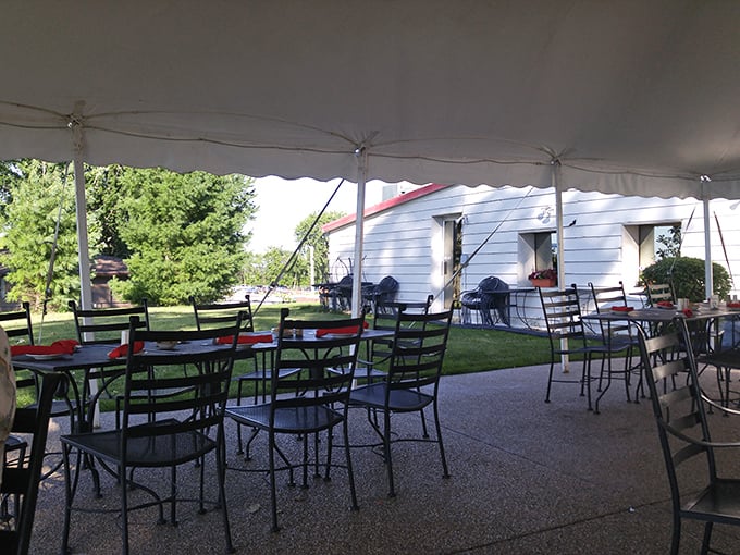 The outdoor patio offers al fresco dining where the breeze carries both the scent of the lake and the promise of a meal worth remembering. 