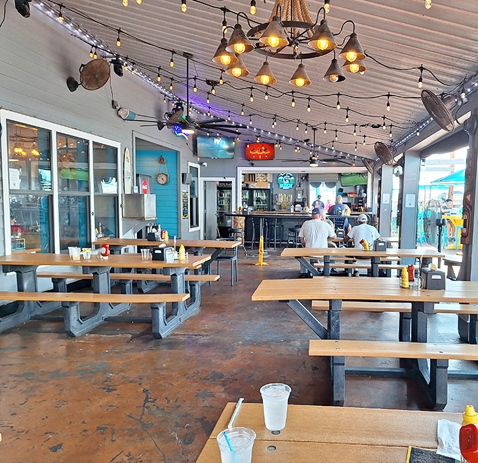 Picnic tables bathed in string light glow create the perfect stage for seafood memories – casual, unpretentious, and exactly right for life's best moments.