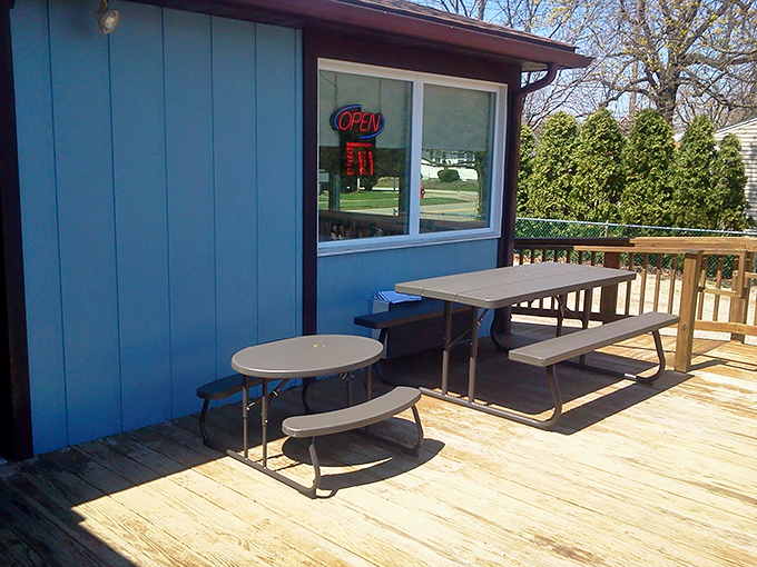 Outdoor seating for when the weather cooperates&mdash;simple picnic tables where summer memories are made between bites of hometown cooking.