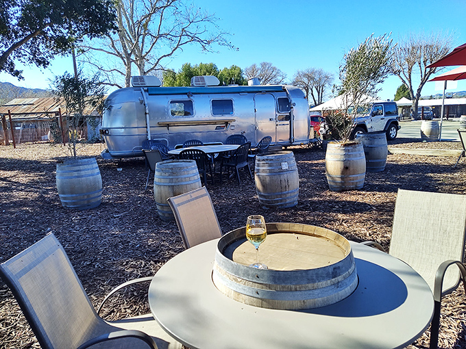 Wine country innovation: vintage barrels and an Airstream create the perfect backdrop for sipping local vintages. Rustic luxury defined in one perfect scene.
