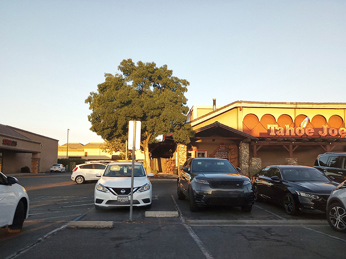 Even from the parking lot, Tahoe Joe's promises a retreat from everyday life. That neon sign glowing at dusk has guided hungry pilgrims to steak salvation for years.