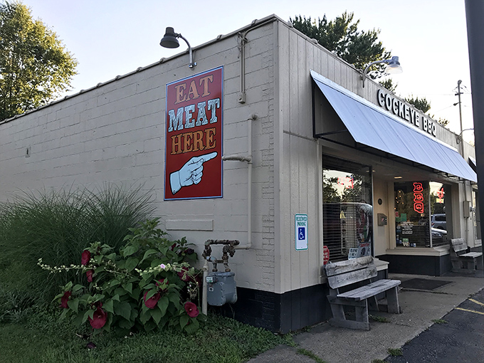 "EAT MEAT HERE" isn't just a sign; it's the most honest advertising you'll ever see. Direct, to the point, impossible to argue with.