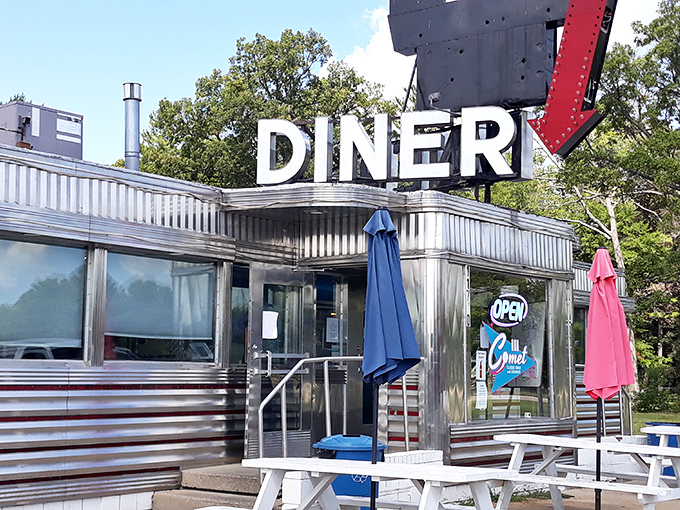 That neon sign doesn't just say "DINER"—it screams "pull over immediately, deliciousness awaits!" A beacon of comfort food joy.