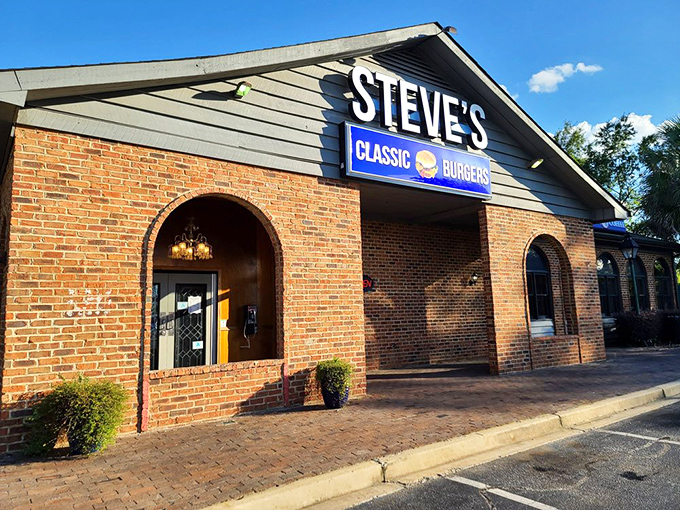 Sunshine highlights Steve's Classic Burgers' brick exterior like nature's spotlight on a local legend. Those arched windows have witnessed countless hungry arrivals and satisfied departures.