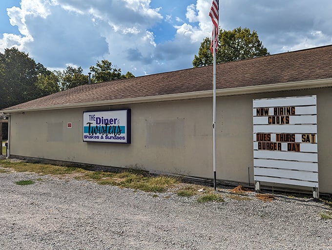 The side view reveals the diner's true character&mdash;humble, straightforward, and proudly announcing burger day like it's a national holiday.