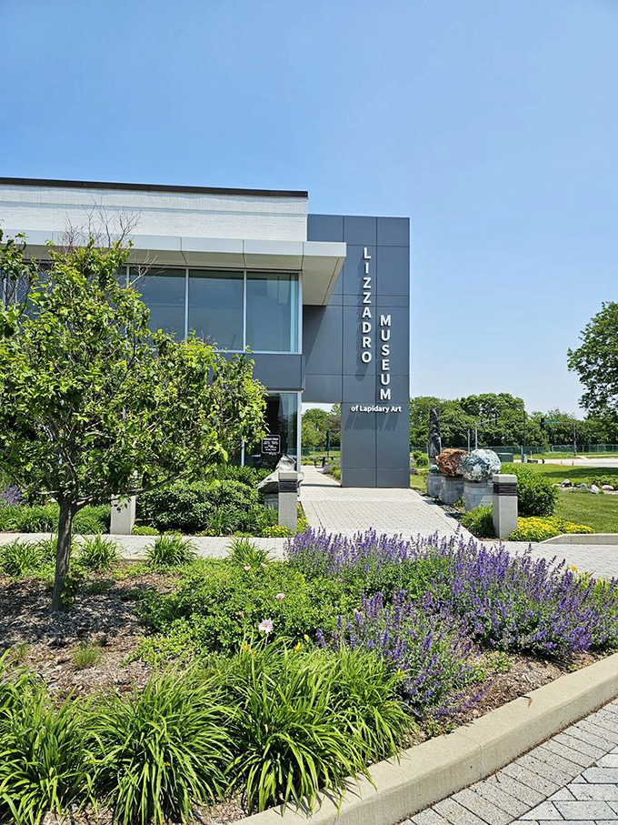 Gardens complement architecture at the museum entrance. Even the landscaping hints at the natural beauty waiting to be discovered inside.
