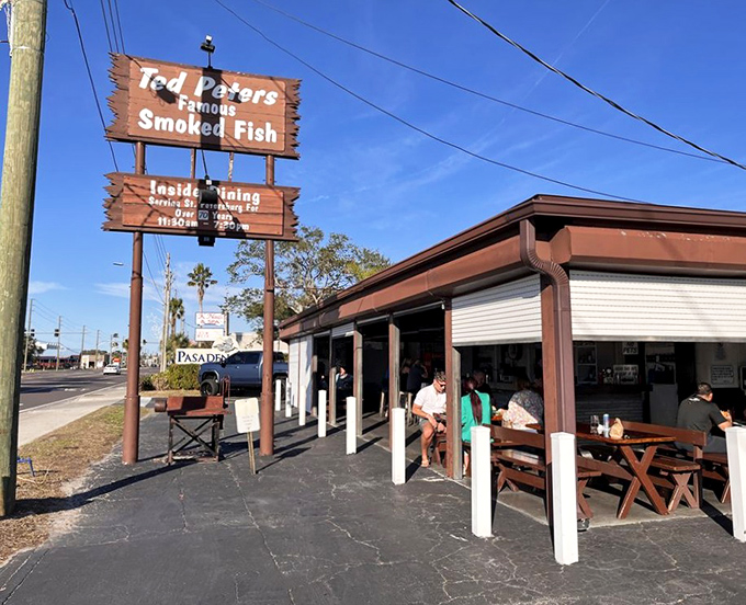The wooden sign that's guided hungry travelers for generations. Like a lighthouse for those lost in a sea of mediocre dining options.