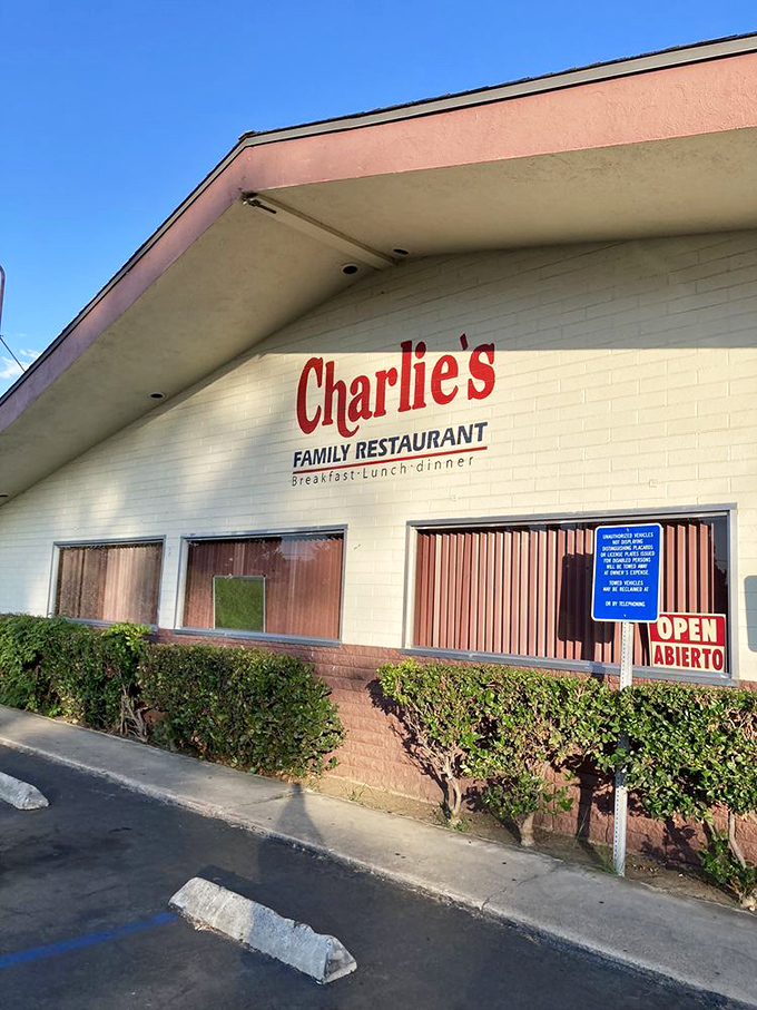 The simple exterior with its "OPEN/ABIERTO" sign promises the same thing it has for years: honest food served with genuine hospitality.