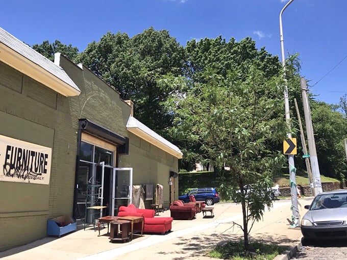 The olive-green exterior houses treasures within, while outdoor displays tempt drivers to pull over for an unexpected shopping adventure.