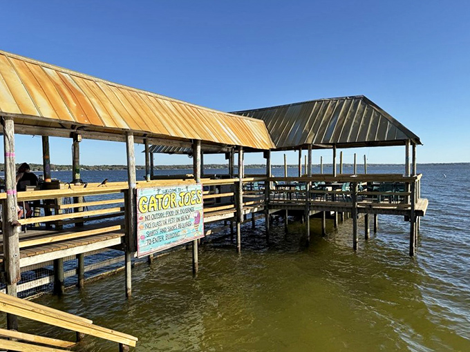 This deck view captures the laid-back atmosphere that makes every meal feel like a mini-vacation.
