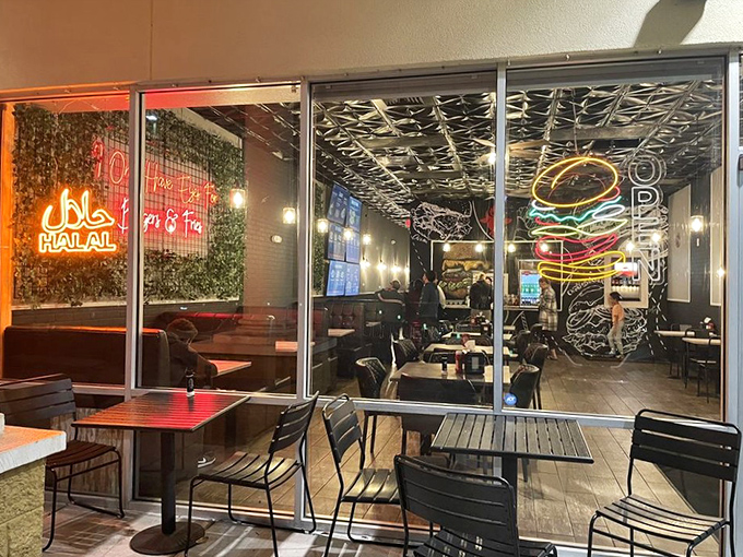 The glowing halal sign in the window isn't just certification&mdash;it's a beacon for burger lovers seeking authentic flavor.