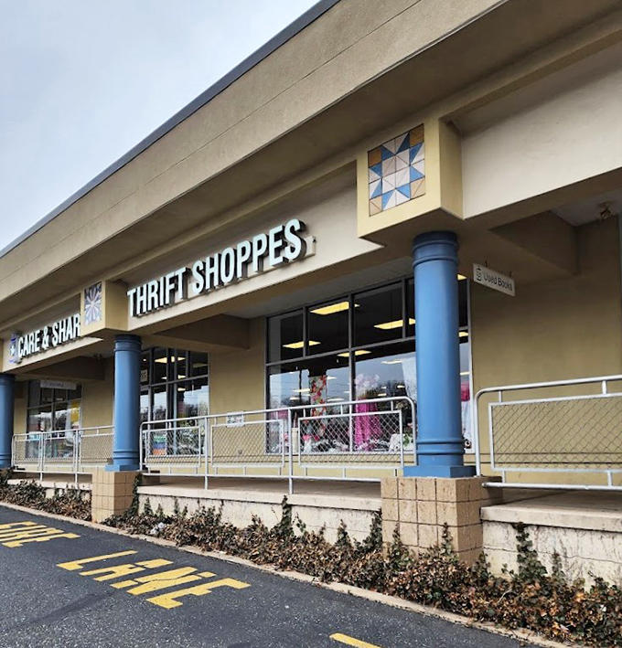 The blue columns stand like sentinels guarding the gateway to bargain paradise. Your wallet's happy place awaits just beyond those doors.