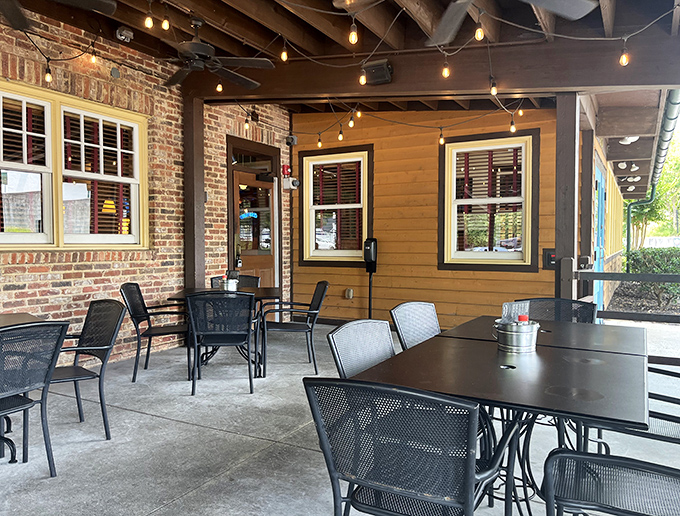 The outdoor seating area: where fresh air meets fresh barbecue, creating a patio paradise that makes al fresco dining feel like a brilliant new invention.