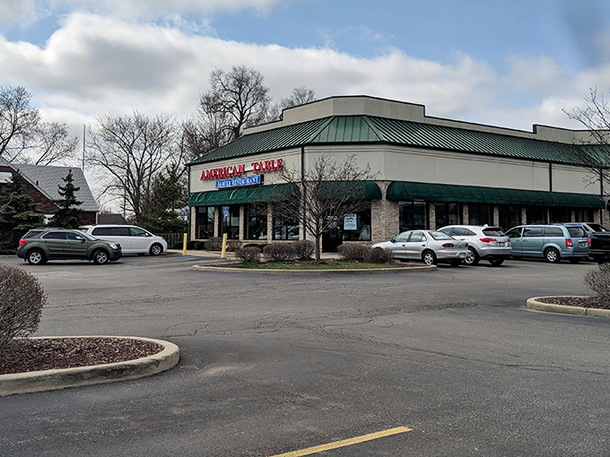 Standing proudly among parked cars, American Table's exterior promises what every hungry traveler seeks: honest food in generous portions at fair prices.