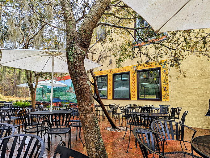 The outdoor seating area, where Spanish moss meets German pretzels, creating Florida's most unexpected but perfect cultural mashup.