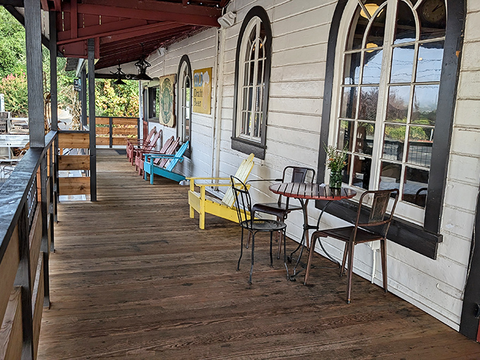 Colorful Adirondack chairs invite you to linger on the porch, where wine country breezes make even waiting for your name to be called a pleasure.