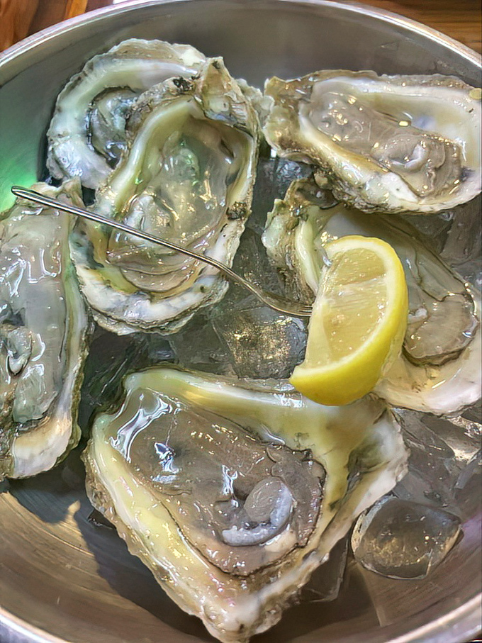 Oysters so fresh they practically wink at you from the shell, glistening like jewels on ice and waiting for just a squeeze of lemon.