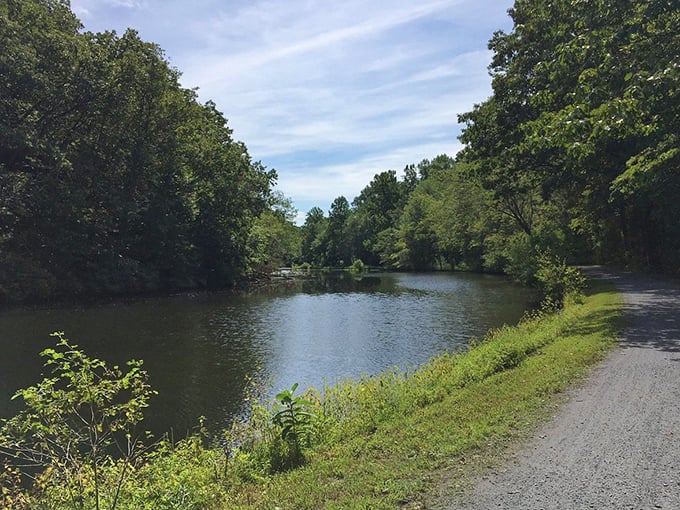 The serene canal path offers a gentle alternative to mountain trails, where contemplative walks lead to contemplating which restaurant to try next.