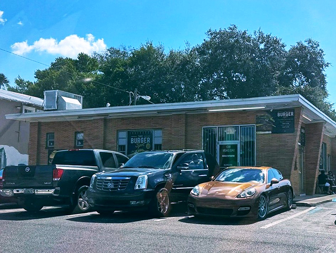 A parking lot filled with everything from work trucks to luxury cars&mdash;proof that good food is the ultimate social equalizer.