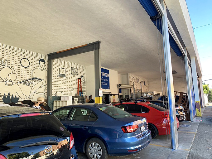 Even the donation area features artistic flair, with line drawings creating a backdrop for the behind-the-scenes magic of secondhand retail.