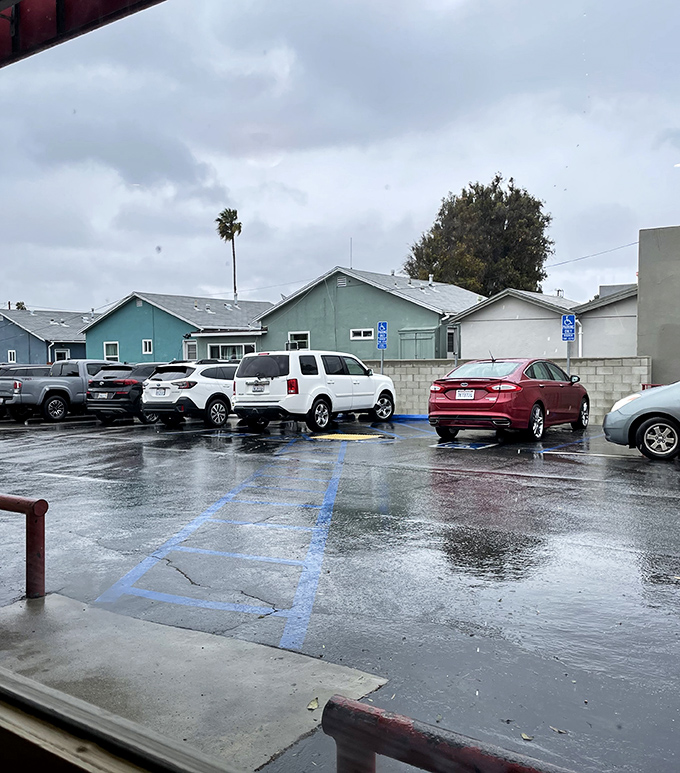 Even on rainy days, the parking lot stays busy&mdash;proof that neither weather nor changing times can dampen Hot 'n Tot's enduring appeal.