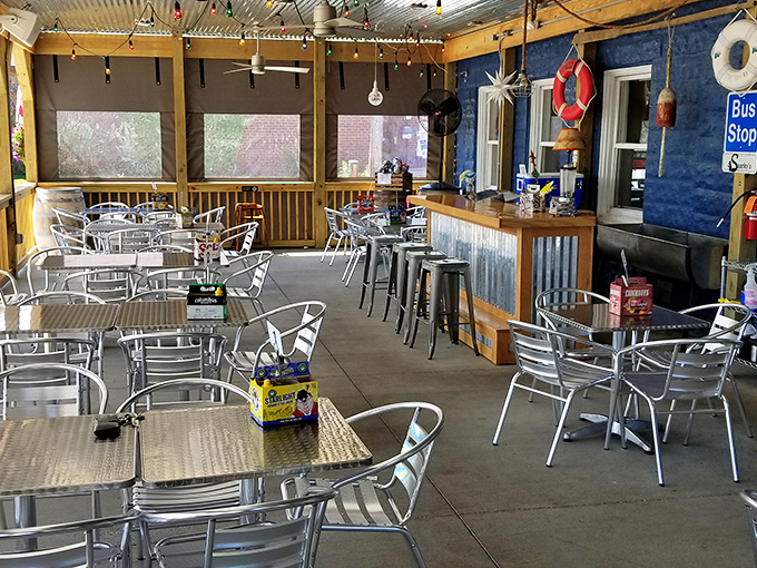 The screened patio offers al fresco dining with nautical touches&mdash;because even in landlocked spots, we all secretly want to feel like we're dining dockside.