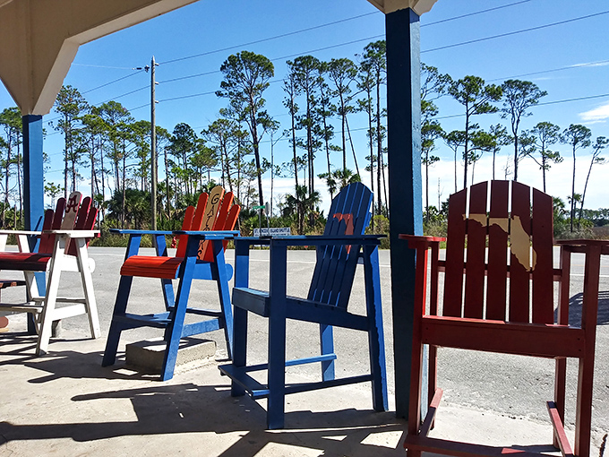 The porch's colorful Adirondack chairs invite you to slow down and savor &ndash; a reminder that the best views in Florida aren't always of the water.