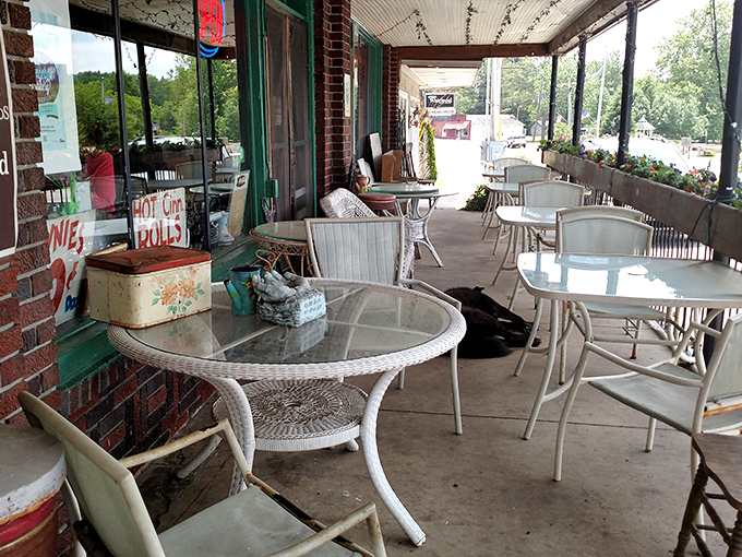 The porch offers a front-row seat to small-town life. White wicker tables invite you to linger over coffee and pastries while watching Tracy City go by.
