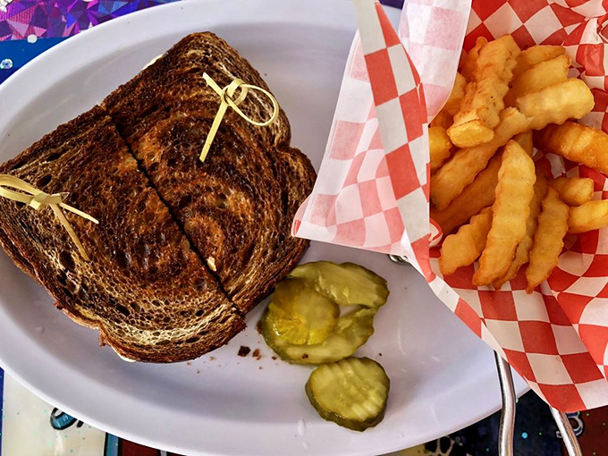 The humble patty melt&mdash;diner royalty on a plate. Those crinkle-cut fries are the perfect crunchy courtiers to this grilled sandwich monarch.