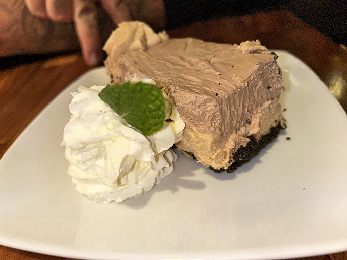 A slice of peanut butter pie that makes a compelling argument for saving room for dessert. Creamy, rich, and worth every calorie-laden bite.