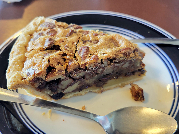 Pecan pie that strikes the perfect balance between gooey and structured. Each bite delivers the sweet, nutty symphony that makes this Southern classic endure through generations.